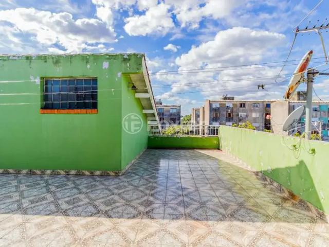 Casa / Sobrado para Venda em Porto Alegre/RS Restinga 3 Quartos