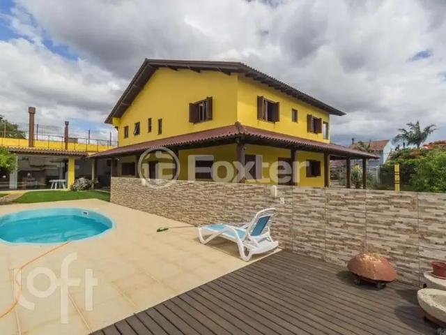 Casa / Sobrado para Venda em Porto Alegre/RS Rubem Berta 4 Quartos