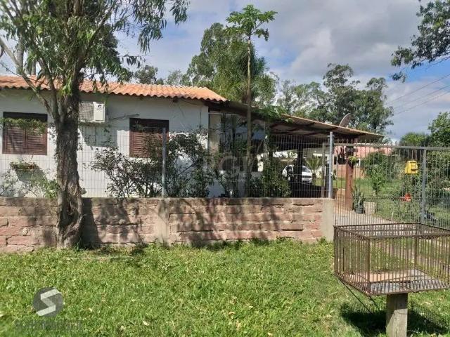 Casa / Sobrado para Venda em Porto Alegre/RS São Caetano 4 Quartos