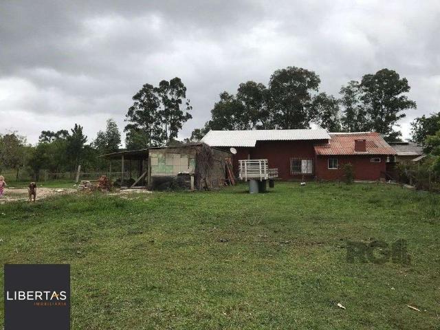 Casa / Sobrado para Venda em Porto Alegre/RS São Caetano 4 Quartos