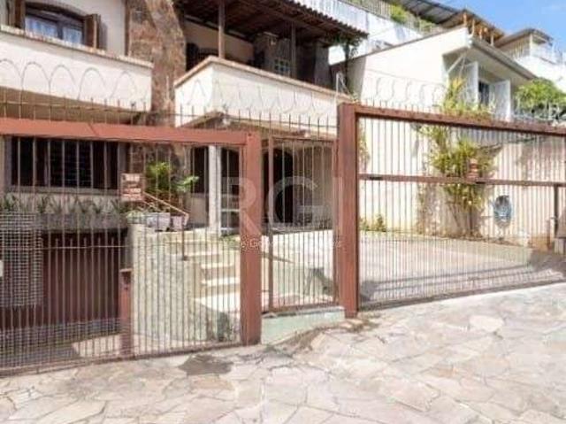 Casa / Sobrado para Venda em Porto Alegre/RS São João 4 Quartos