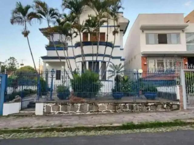 Casa / Sobrado para Venda em Porto Alegre/RS São João 4 Quartos