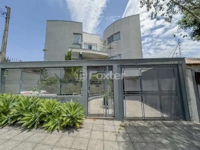 Casa / Sobrado para Venda em Porto Alegre/RS Santo Antônio 3 Quartos