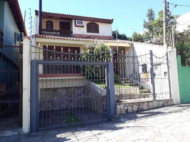 Casa / Sobrado para Venda em Porto Alegre/RS Santo Antônio 3 Quartos