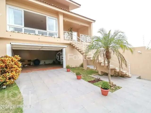 Casa / Sobrado para Venda em Porto Alegre/RS Santo Antônio 3 Quartos