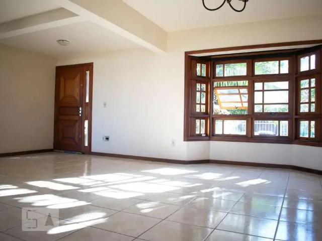 Casa / Sobrado para Venda em Porto Alegre/RS Santo Antônio 4 Quartos