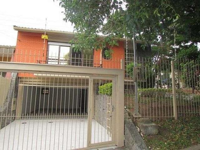 Casa / Sobrado para Venda em Porto Alegre/RS Santo Antônio 4 Quartos