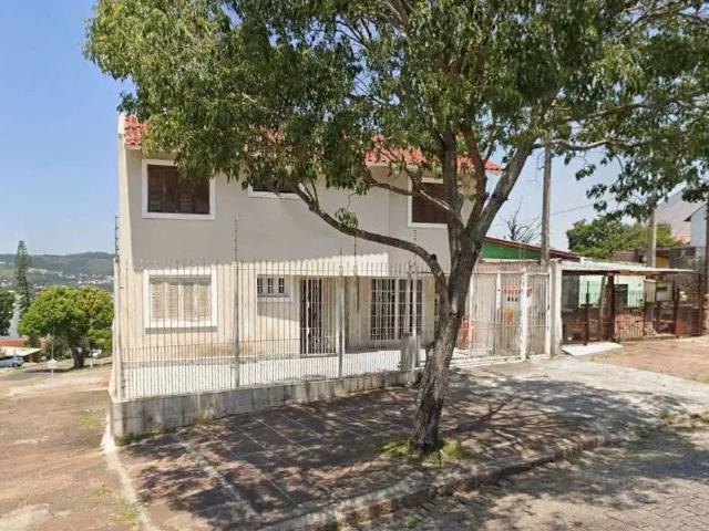 Casa / Sobrado para Venda em Porto Alegre/RS Santo Antônio 4 Quartos