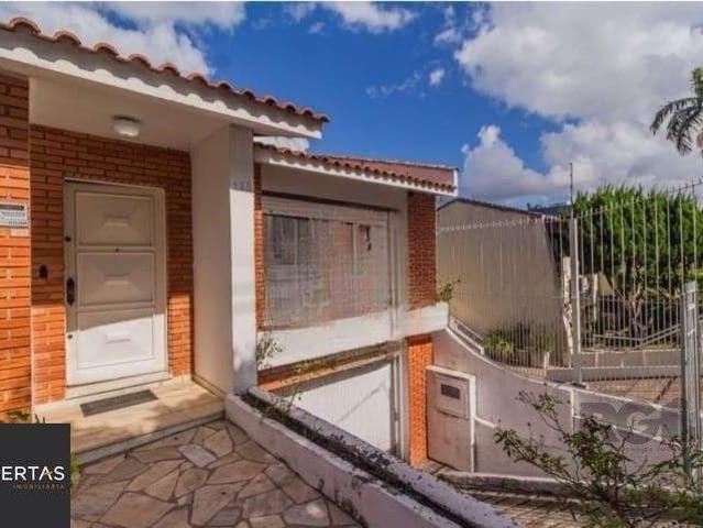 Casa / Sobrado para Venda em Porto Alegre/RS Santo Antônio 4 Quartos