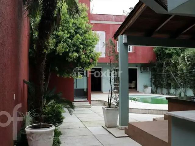 Casa / Sobrado para Venda em Porto Alegre/RS Santo Antônio 4 Quartos