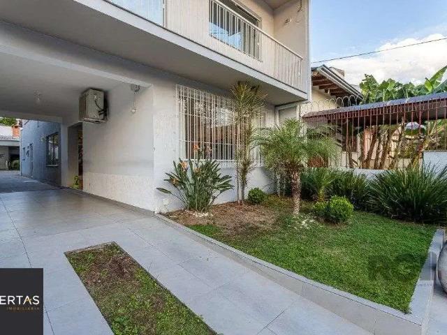Casa / Sobrado para Venda em Porto Alegre/RS Santo Antônio 4 Quartos