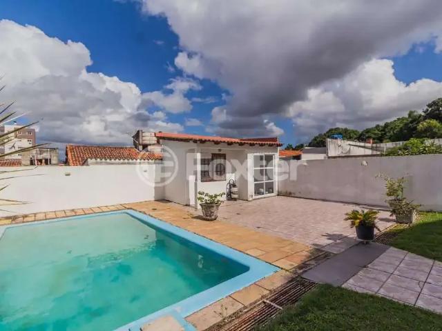 Casa / Sobrado para Venda em Porto Alegre/RS Santo Antônio 4 Quartos