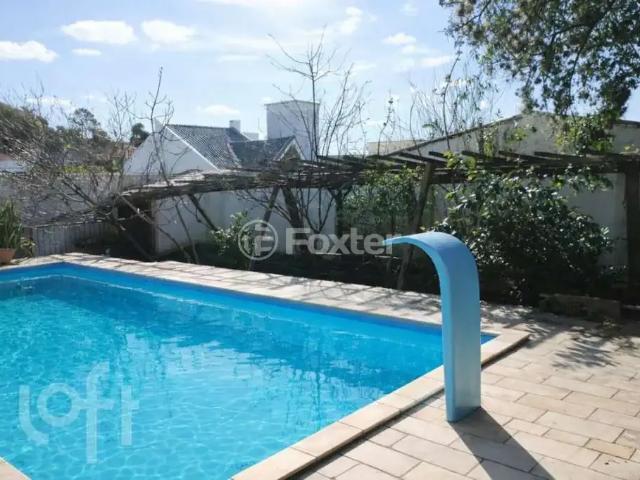 Casa / Sobrado para Venda em Porto Alegre/RS Santo Antônio 4 Quartos