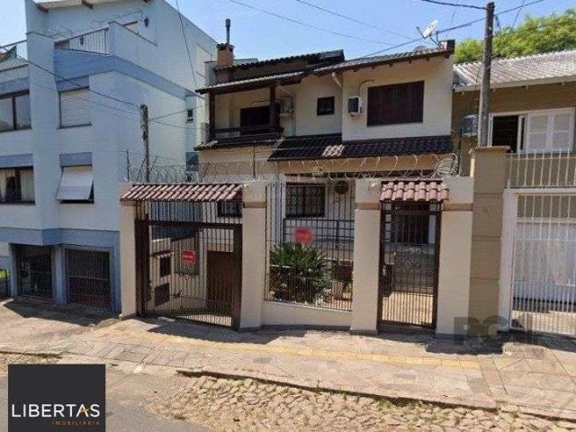 Casa / Sobrado para Venda em Porto Alegre/RS Santo Antônio 4 Quartos