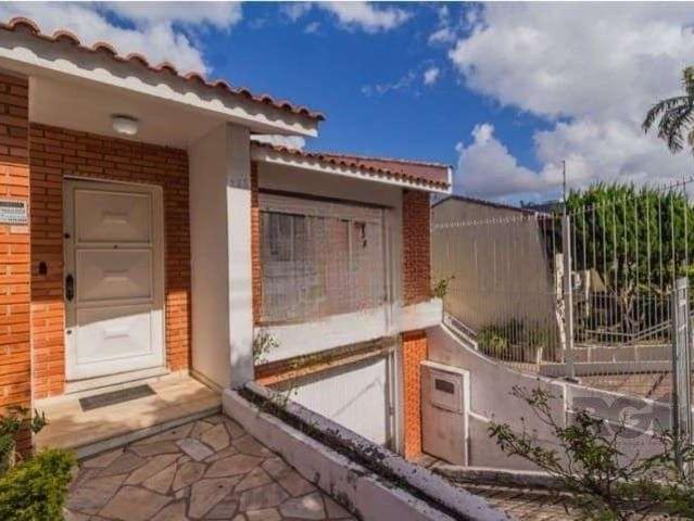 Casa / Sobrado para Venda em Porto Alegre/RS Santo Antônio 4 Quartos