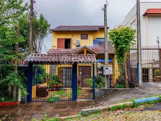 Casa / Sobrado para Venda em Porto Alegre/RS Santo Antônio 4 Quartos