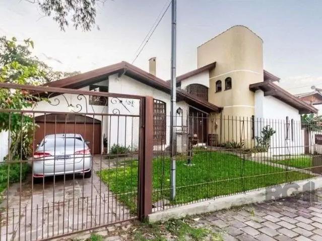 Casa / Sobrado para Venda em Porto Alegre/RS Santo Antônio 4 Quartos