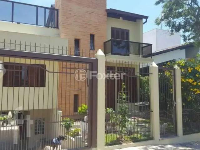 Casa / Sobrado para Venda em Porto Alegre/RS Santo Antônio 6 Quartos