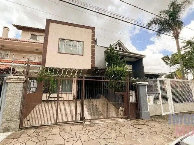Casa / Sobrado para Venda em Porto Alegre/RS Sarandi 4 Quartos