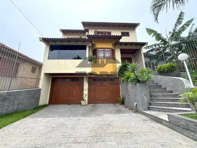 Casa / Sobrado para Venda em Porto Alegre/RS Sarandi 4 Quartos