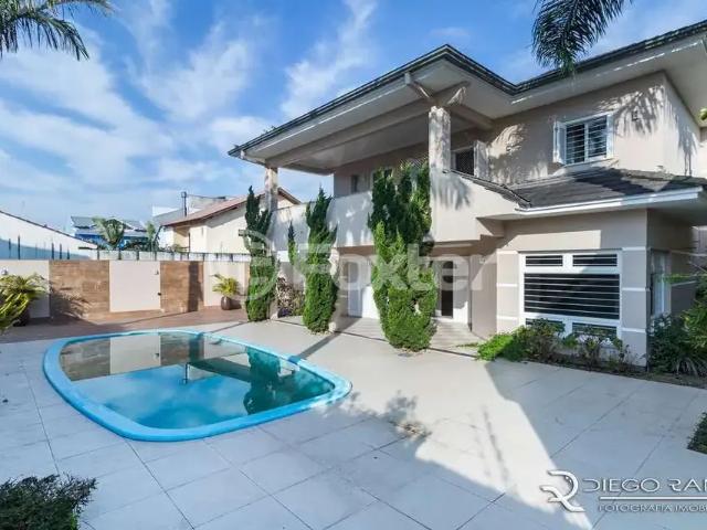Casa / Sobrado para Venda em Porto Alegre/RS Sarandi 4 Quartos