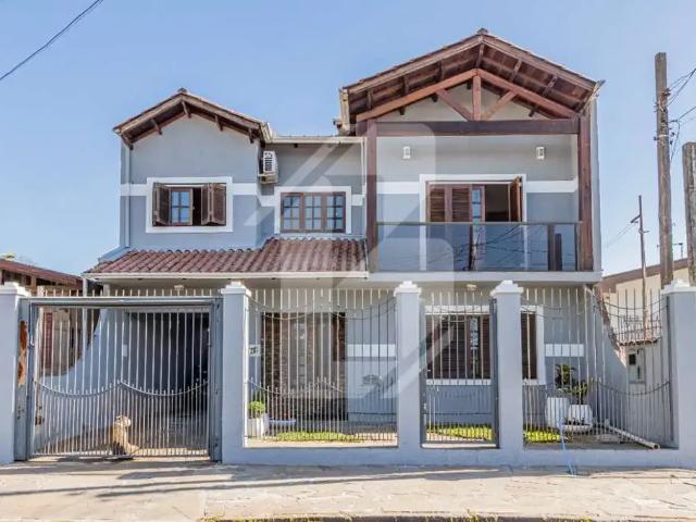 Casa / Sobrado para Venda em Porto Alegre/RS Sarandi 4 Quartos