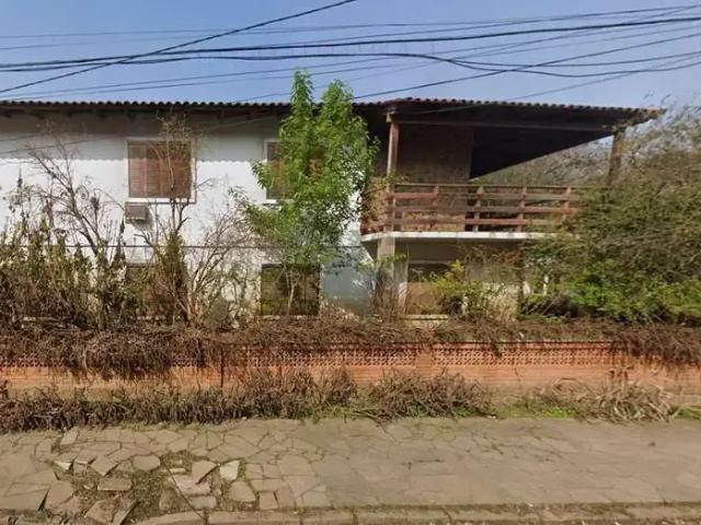 Casa / Sobrado para Venda em Porto Alegre/RS Sarandi 5 Quartos