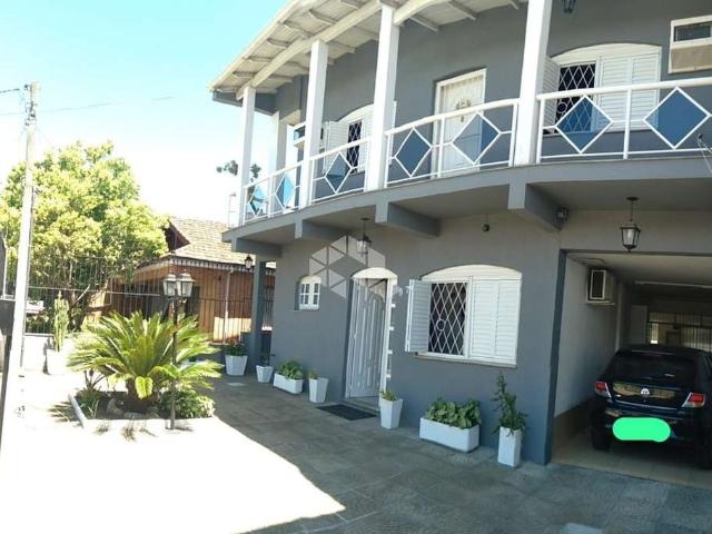 Casa / Sobrado para Venda em Porto Alegre/RS Sarandi 5 Quartos