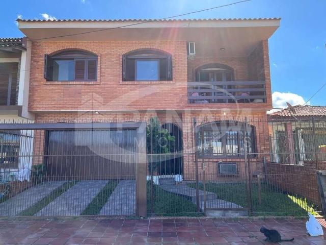 Casa / Sobrado para Venda em Porto Alegre/RS Sarandi 5 Quartos