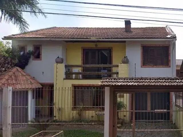 Casa / Sobrado para Venda em Porto Alegre/RS Serraria 4 Quartos