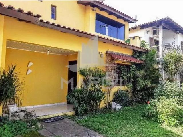 Casa / Sobrado para Venda em Porto Alegre/RS Serraria 4 Quartos