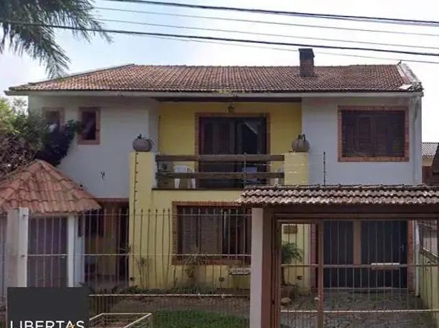 Casa / Sobrado para Venda em Porto Alegre/RS Serraria 4 Quartos