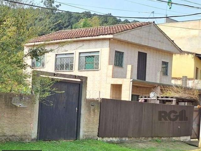 Casa / Sobrado para Venda em Porto Alegre/RS Guarujá 4 Quartos