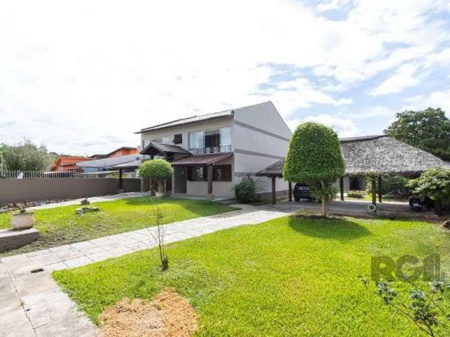 Casa / Sobrado para Venda em Porto Alegre/RS Serraria 4 Quartos