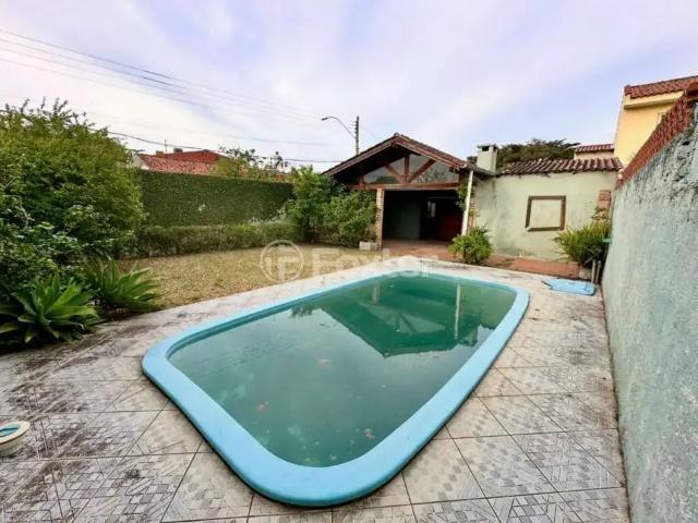 Casa / Sobrado para Venda em Porto Alegre/RS Serraria 3 Quartos