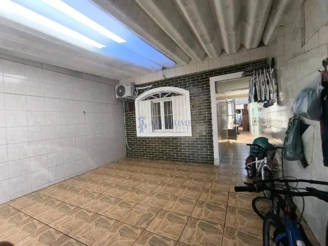 Casa / Sobrado para Venda em Praia Grande/SP Tupi 3 Quartos