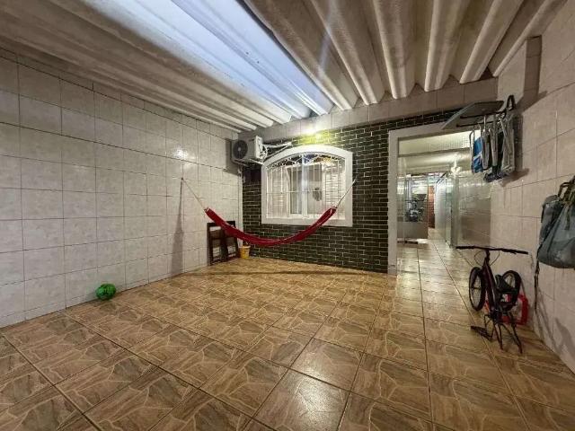 Casa / Sobrado para Venda em Praia Grande/SP Tupi 3 Quartos