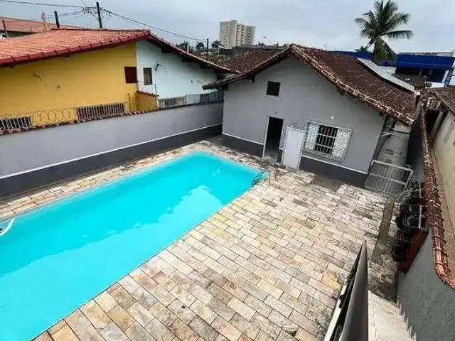 Casa / Sobrado para Venda em Praia Grande/SP Tupi 4 Quartos