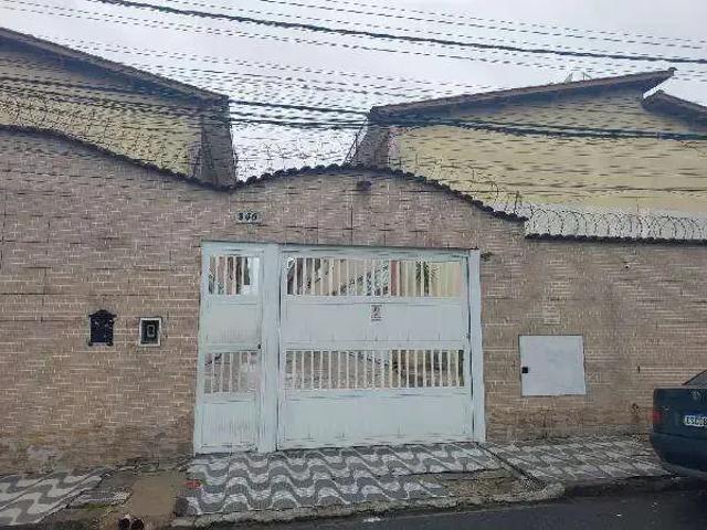 Casa / Sobrado para Venda em Praia Grande/SP Vila Mirim 2 Quartos