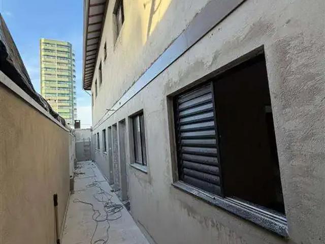 Casa / Sobrado para Venda em Praia Grande/SP Vila Mirim 3 Quartos