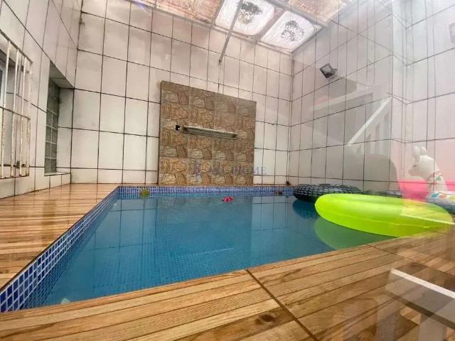 Casa / Sobrado para Venda em Praia Grande/SP Vila Mirim 3 Quartos