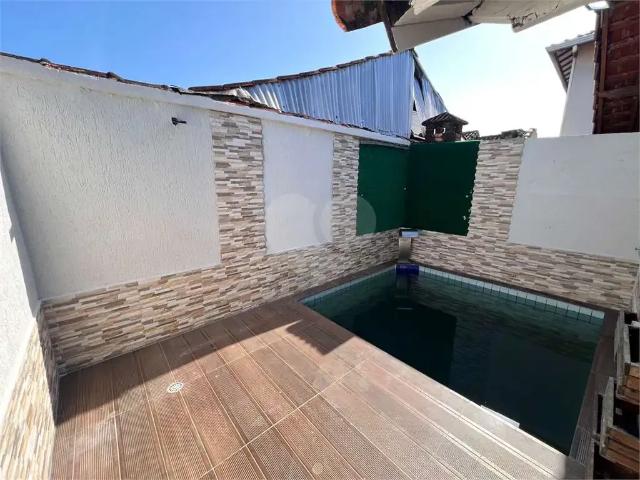 Casa / Sobrado para Venda em Praia Grande/SP Vila Caiçara 2 Quartos