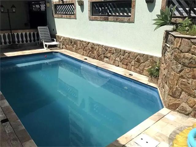 Casa / Sobrado para Venda em Praia Grande/SP Vila Caiçara 4 Quartos