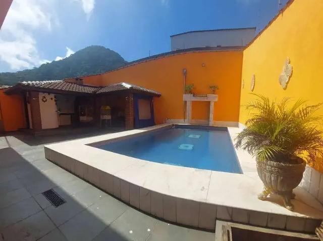 Casa / Sobrado para Venda em Praia Grande/SP Canto do Forte 4 Quartos