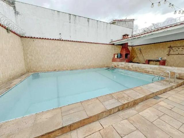 Casa / Sobrado para Venda em Praia Grande/SP Canto do Forte 4 Quartos