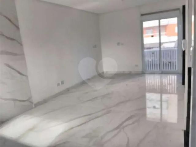 Casa / Sobrado para Venda em Praia Grande/SP Guilhermina 2 Quartos