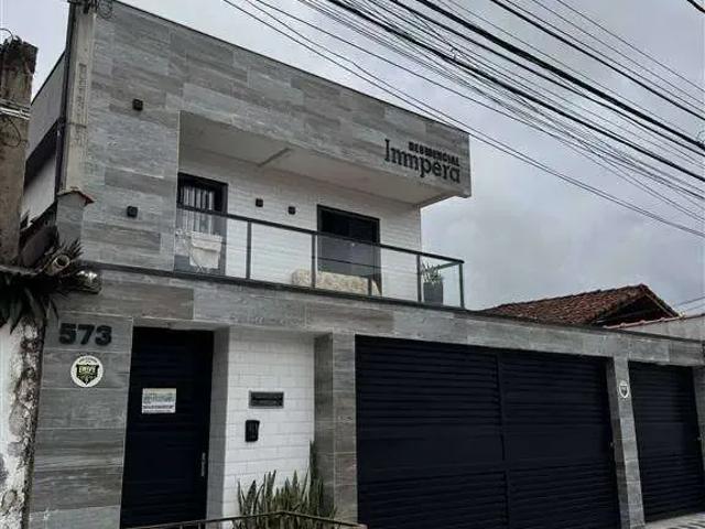 Casa / Sobrado para Venda em Praia Grande/SP Guilhermina 2 Quartos
