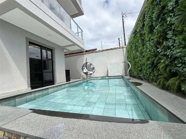 Casa / Sobrado para Venda em Praia Grande/SP Guilhermina 3 Quartos