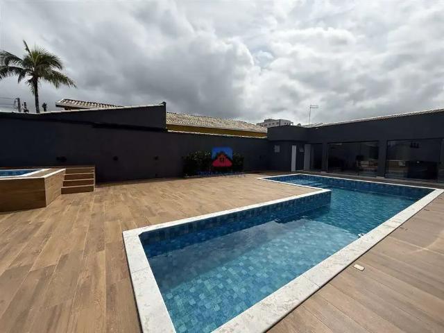 Casa / Sobrado para Venda em Praia Grande/SP Jardim Real 4 Quartos