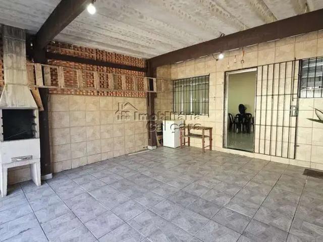 Casa / Sobrado para Venda em Praia Grande/SP Jardim Real 1 Quartos